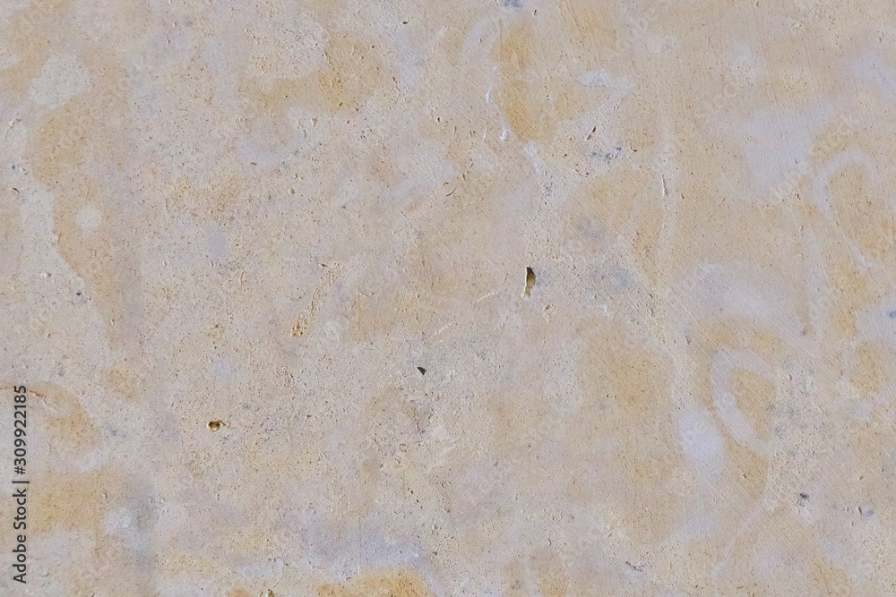 Background of porous limestone stone of orange color. Orange tone stone ...