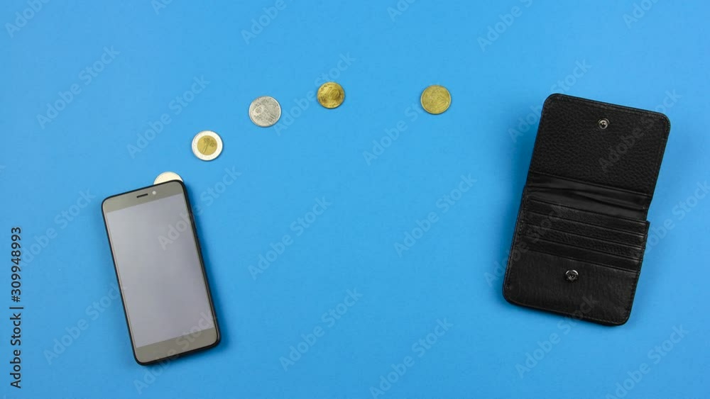 cash currency coins moves from black leather wallet to smartphone and ...
