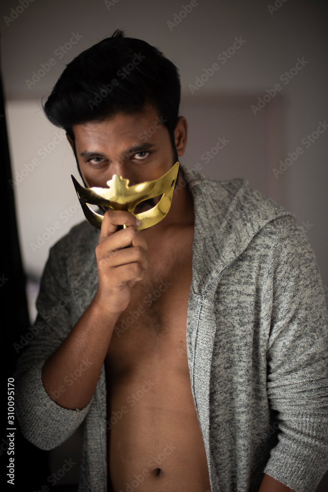 An young,tall,dark and handsome Indian Bengali man wearing a golden ...
