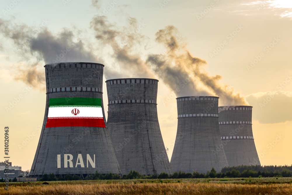 Nuclear plant chimneys displaying flag of Iran with according text ...