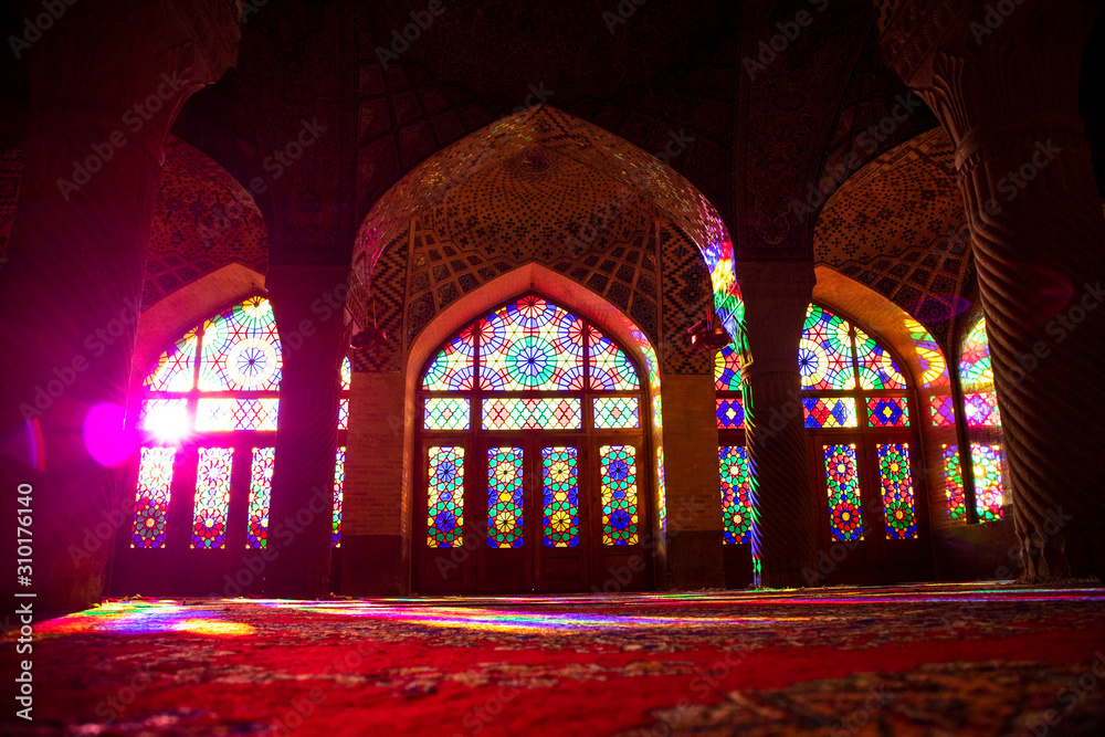 Shiraz, Iran. The sunlit stained-glass windows in the morning sun in ...