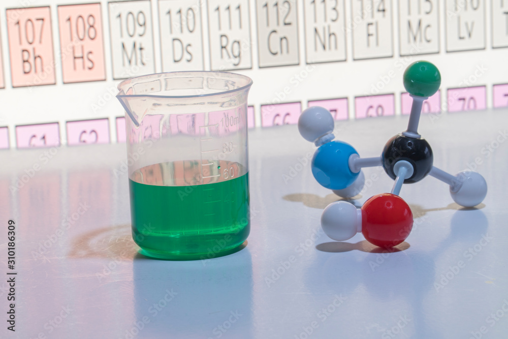Chemicals in liquid form for educational purposes with the periodic ...