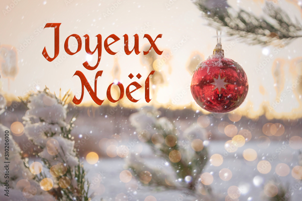 "Joyeux Noël" means "Merry Christmas" in French. Blurred background of ...
