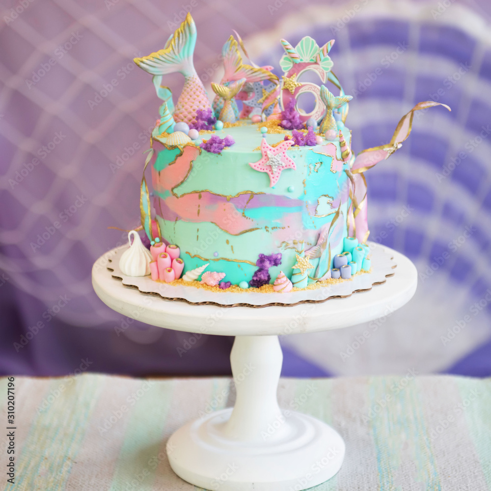 Mermaid Candy Bar. Delicious sweet buffet with cake. A beautiful cake ...