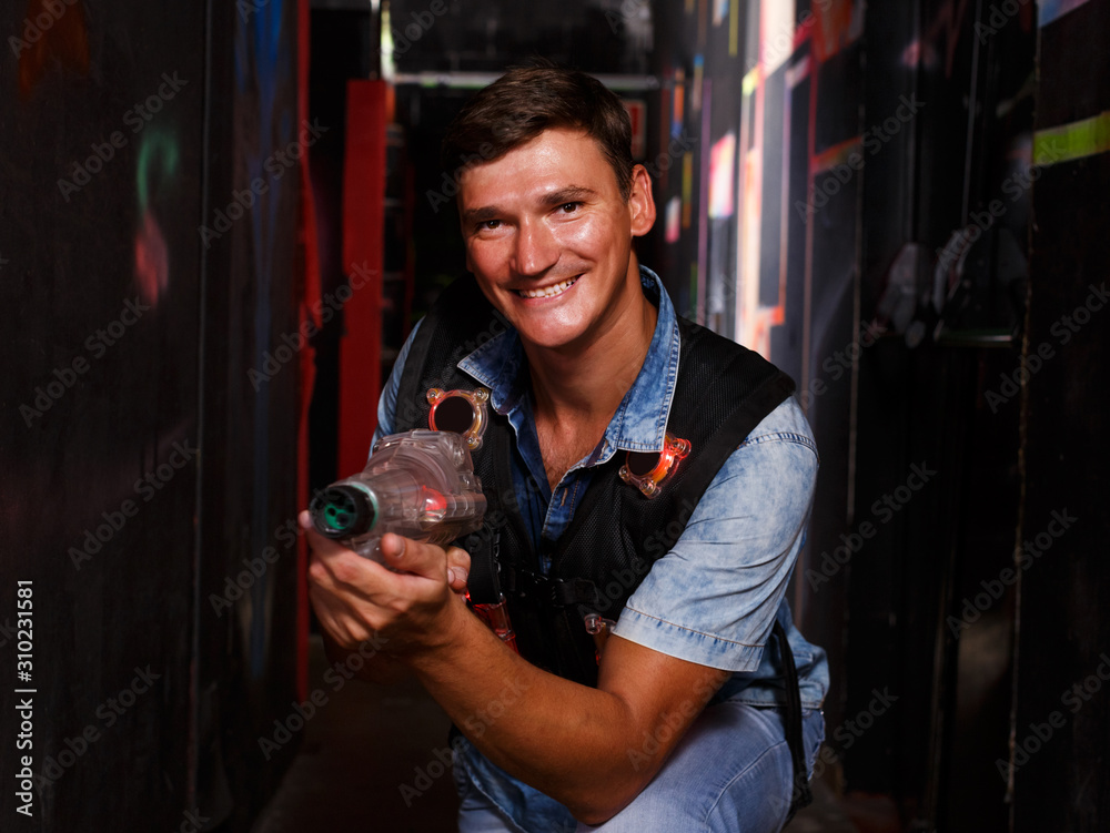 guy took aim colored laser guns during laser tag game Stock Photo ...