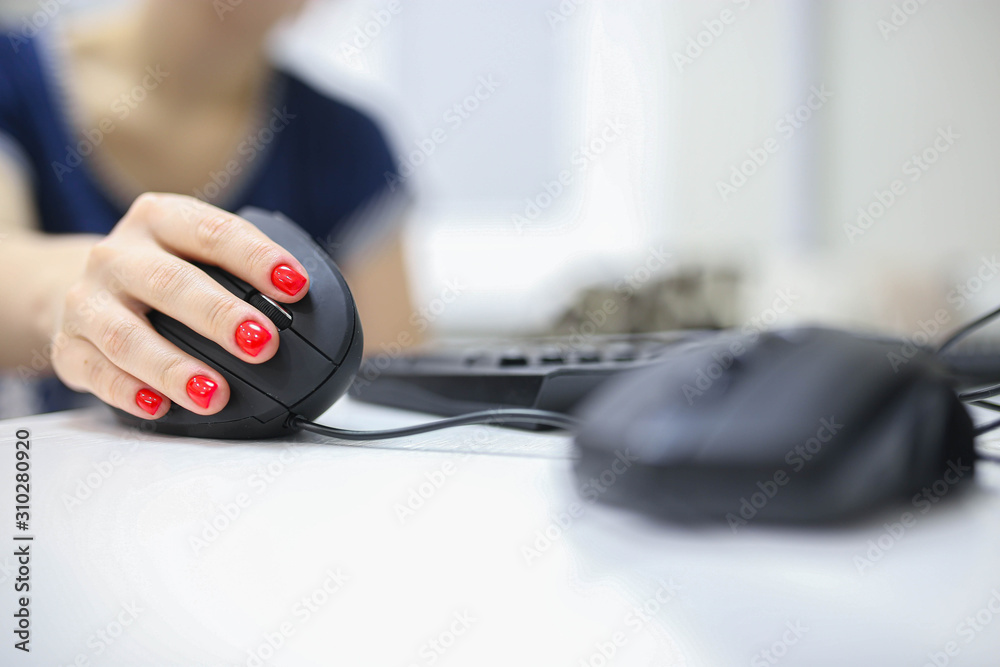 girl's hand uses a vertical ergonomic computer mouse joystick. Stock ...