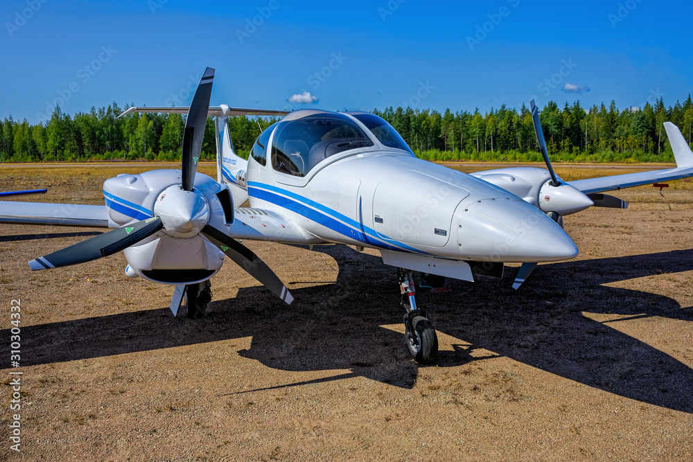 Four-seat light all-metal twin engine propeller-driven utility and ...