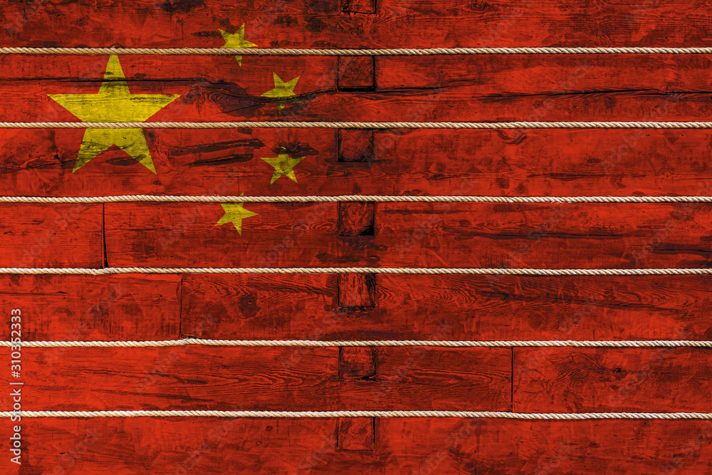 National flag of China on a wooden wall background. The concept of ...