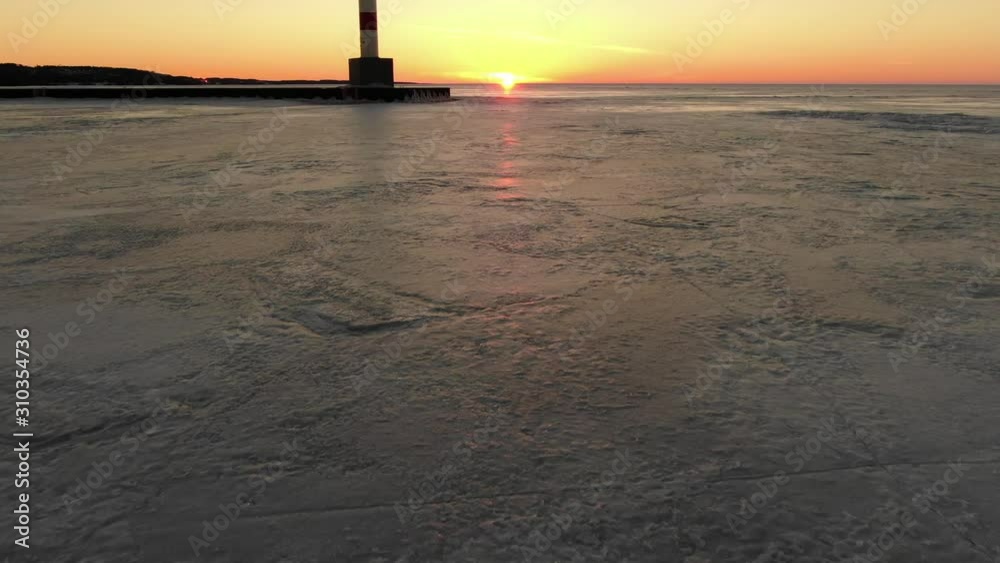 Petoskey Lighthouse Sunset Orange Sky Winter North Frozen Lake Michigan ...