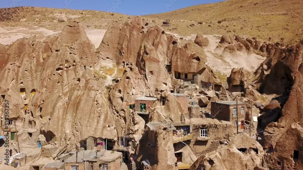 Unusual naturally formed carved rock cave houses of Kandovan, Iran ...