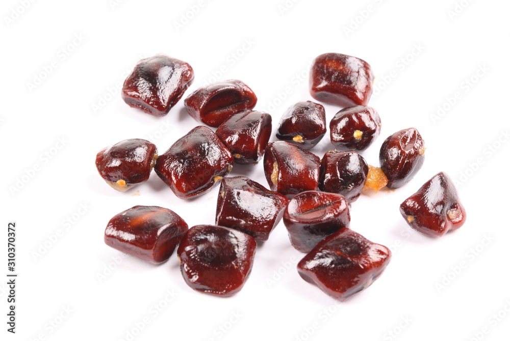 Image of tamarind seeds on a white background. Stock Photo | Adobe Stock
