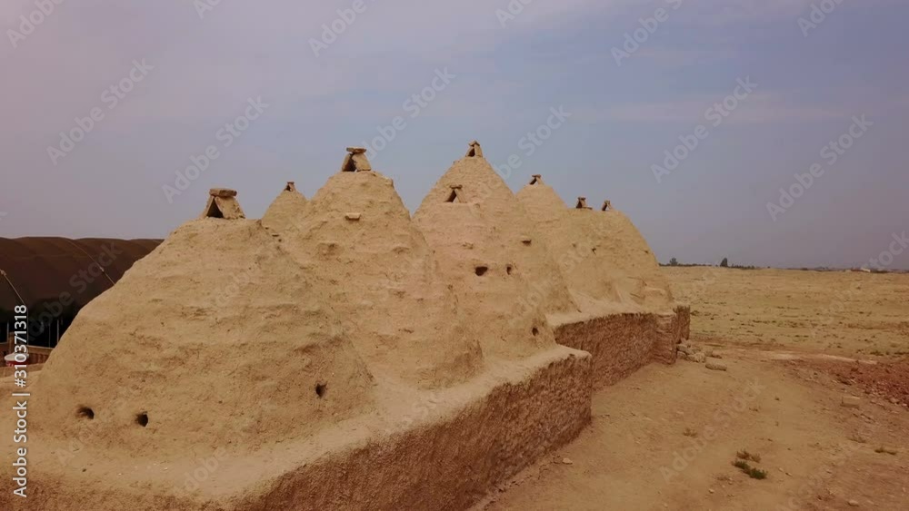 Harran beehive houses that conic roofs, mudbrick wall, Urfa, Turkey ...