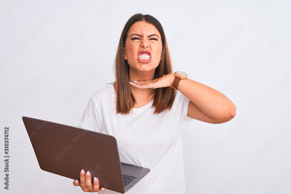 Beautiful young woman working using computer laptop over white ...