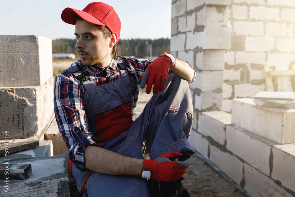 Professional bricklayer at the construction site Stock-Foto | Adobe Stock