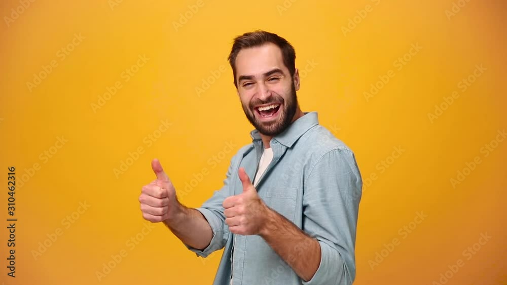 Handsome smiling guy 20s in denim shirt white t-shirt isolated on ...