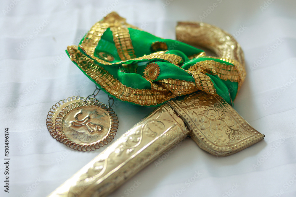 Badik Bugis, a traditional weapon of the Bugis Makassar tribe in a gold ...