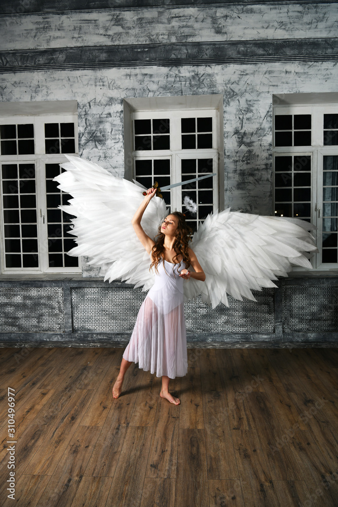 white angel with a sword of fair retribution and a crystal ball on a ...