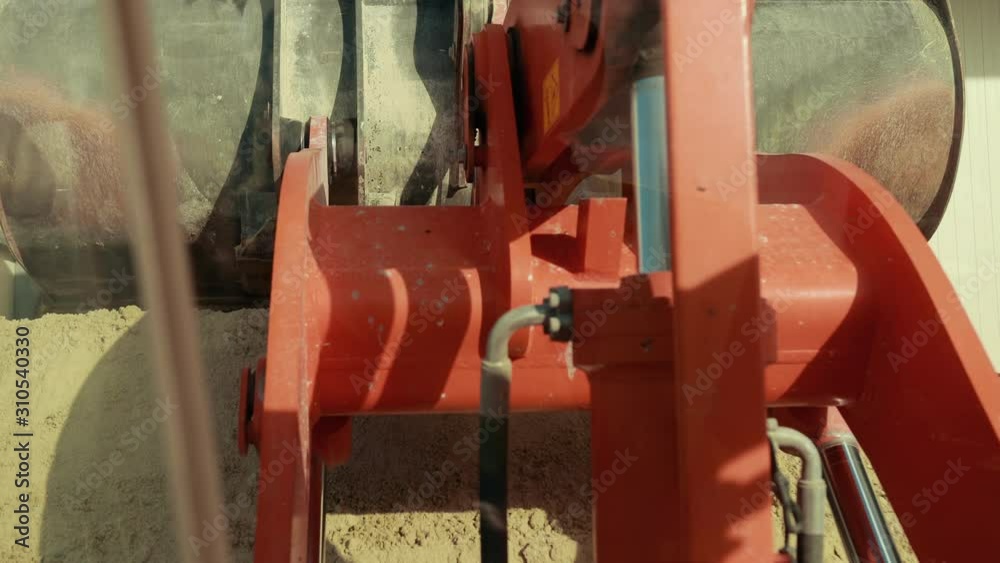 Close up of arm of tractor as how it actually works. It has a very ...