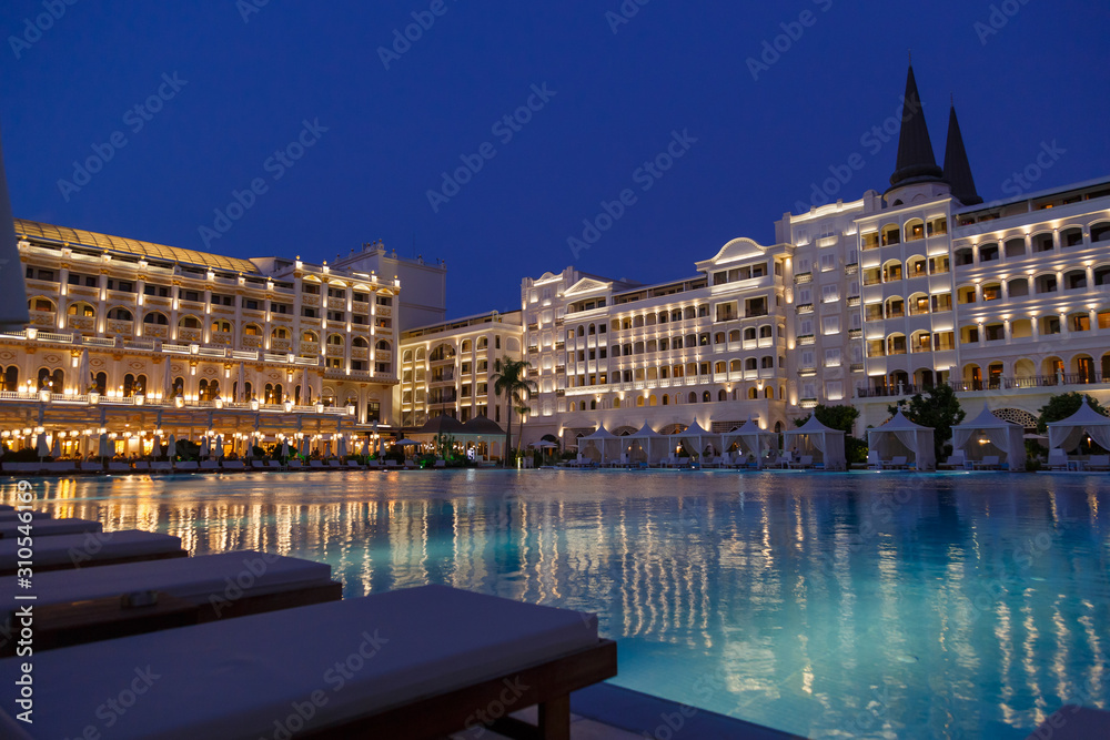 ANTALYA, TURKEY - SEPTEMBER 12, 2019: Exterior and swim pool at night ...