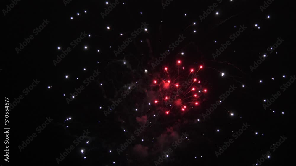 shining fireworks with bokeh lights in night sky. glowing fireworks ...