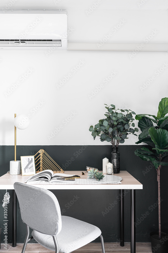 Stylish working corner in scandinavian style with nice decoration and ...