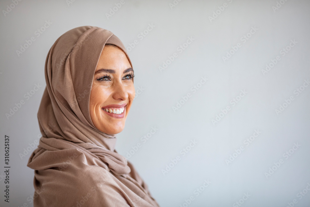 Beautiful muslim woman posing and smiling. Portrait of a beautiful ...