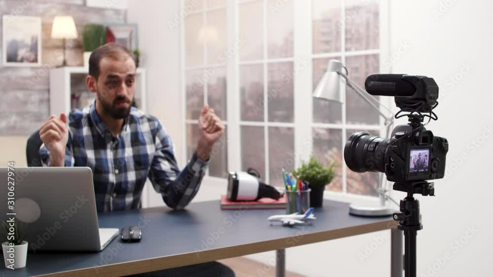 Angry influencer while recording a vlog Stock Video | Adobe Stock