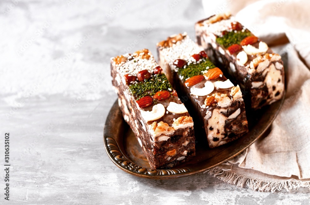 Chocolate halva with different nuts Stock Photo | Adobe Stock