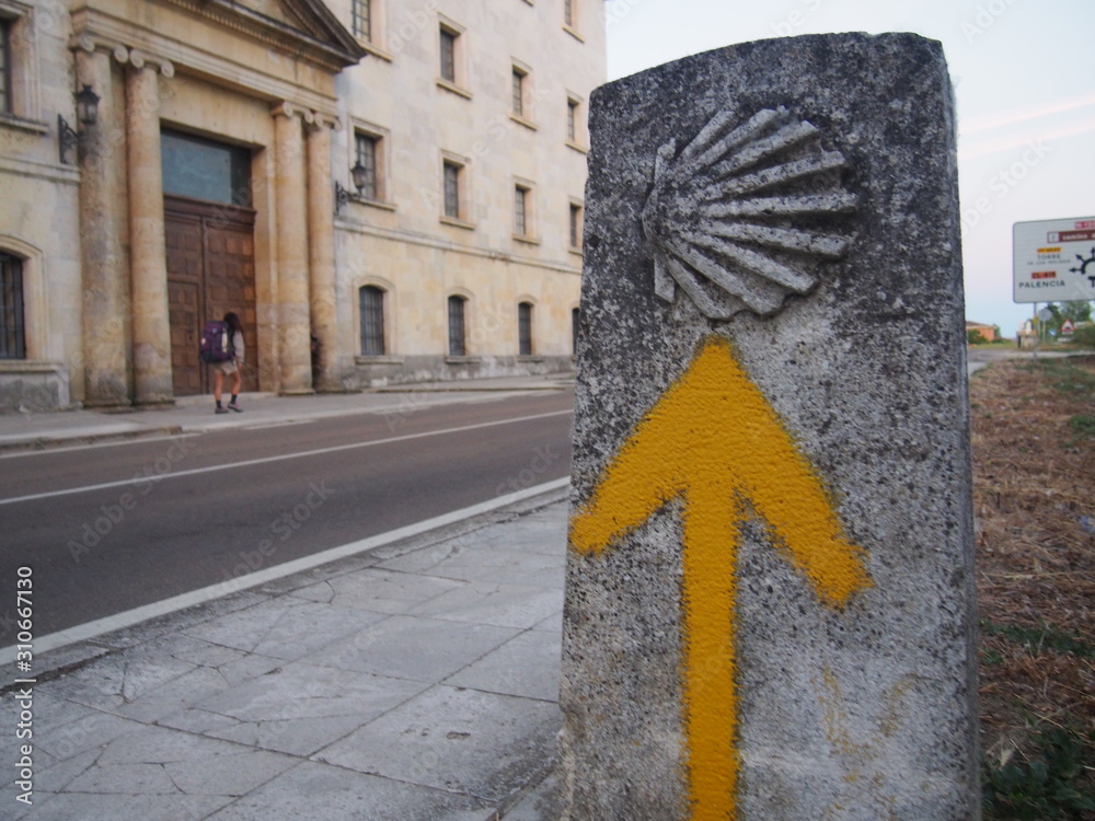 Scallop shell mark and yellow arrow sign, Camino de Santiago, Way of St ...
