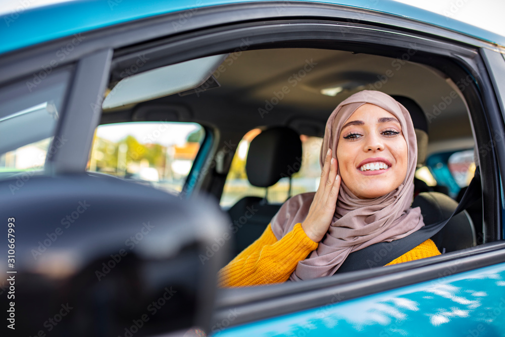 Happy Young Muslim Woman With Beautiful Smile Driving Car Beautiful Girl Is Smiling While