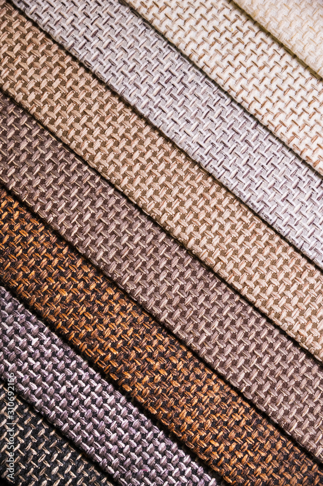 Colorful and bright fabric samples of furniture and clothing upholstery ...