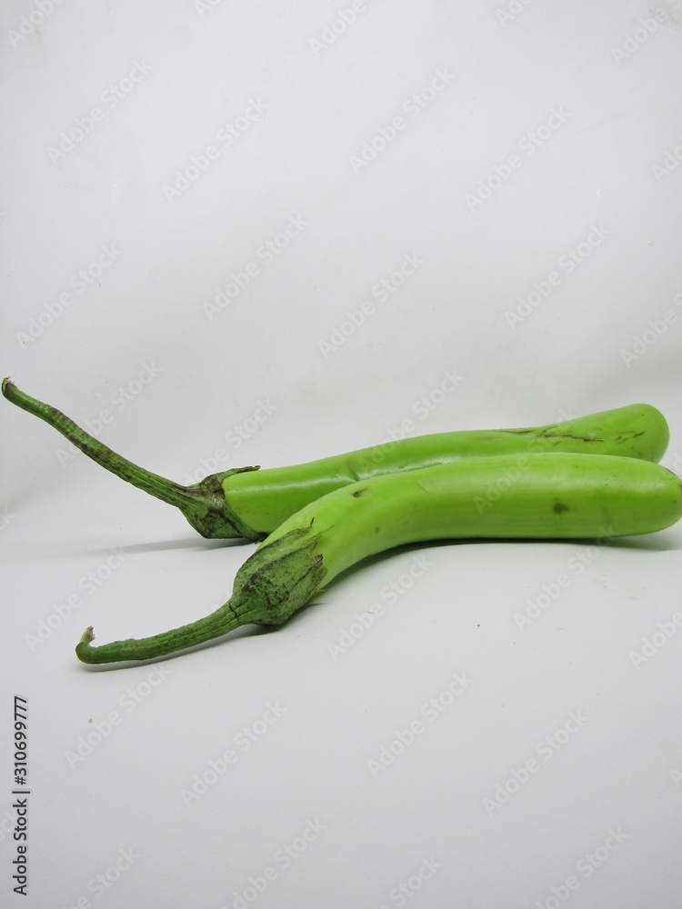 Close up view of green color eggplant or terung terong hijau or ...