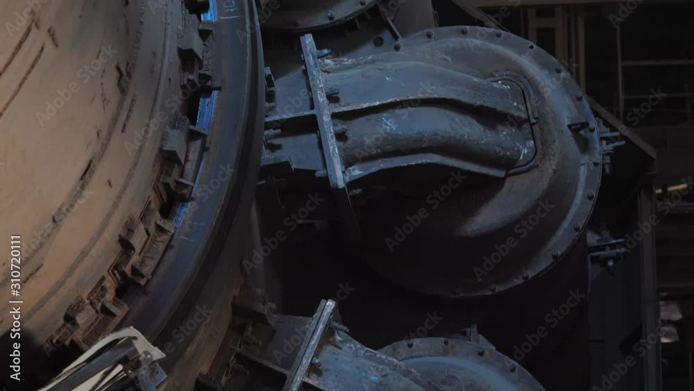 Rotary burning kiln on a cement plant. Industrial production process of ...