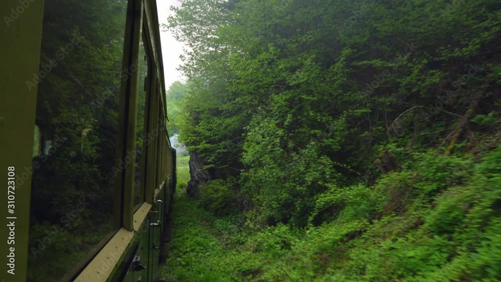 view from the window of a retro train wagon, Old steam locomotive in ...