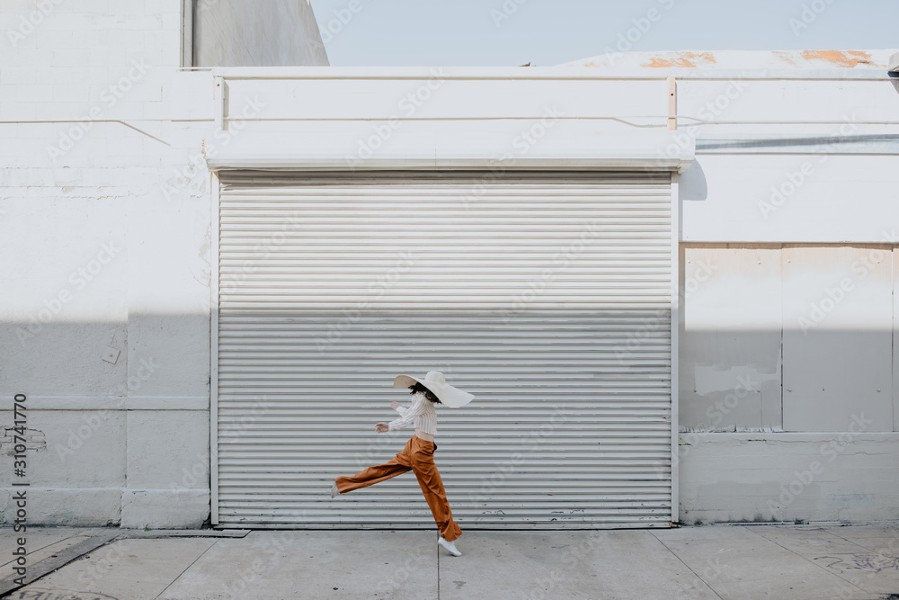 Girl hoping into the picture Stock Photo | Adobe Stock