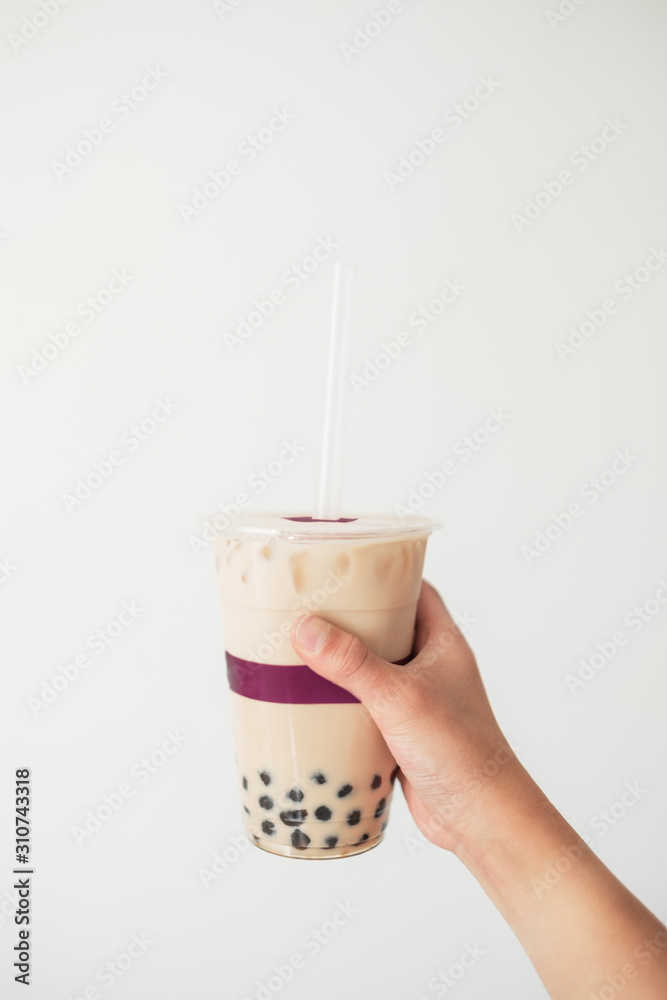 Child Hand Holding Bubble Tea or Boba Stock Photo | Adobe Stock
