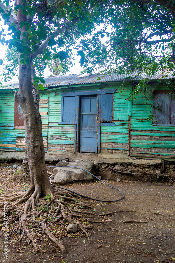 dramatic aqua wooden old shack in the mountains of the dominican ...