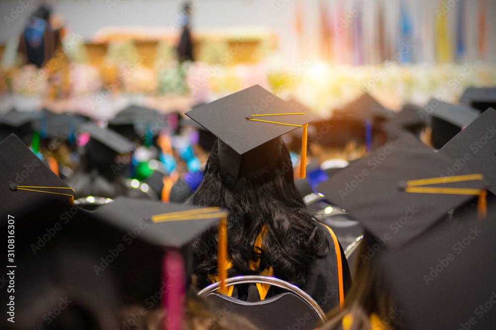 Soft selective focus rear view of the graduates in the graduation ...