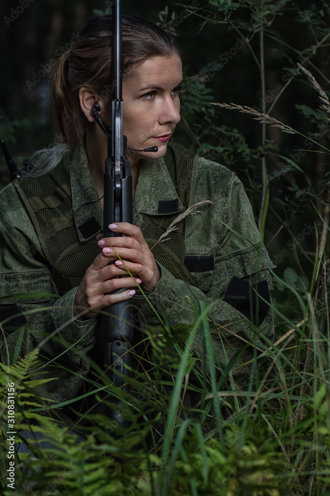 Portrait of beautiful army girl, soldier woman with rifle with optical ...