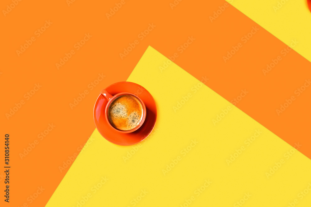 Orange and yellow background with cup of tasty coffee surrounded by ...