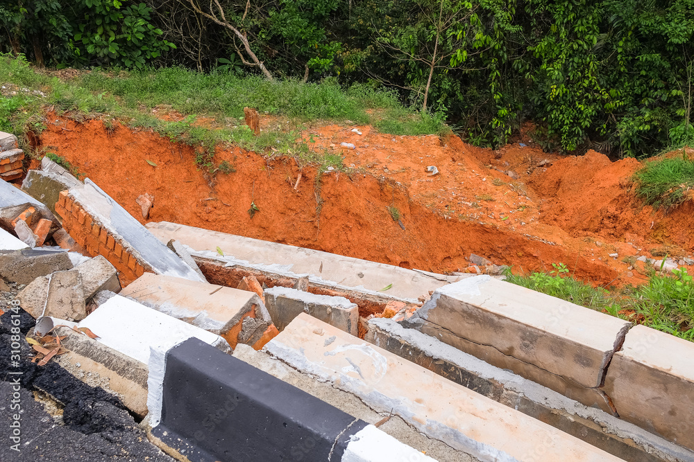 Drain damage. Soil erosion or landslide in the slope during the rainy ...