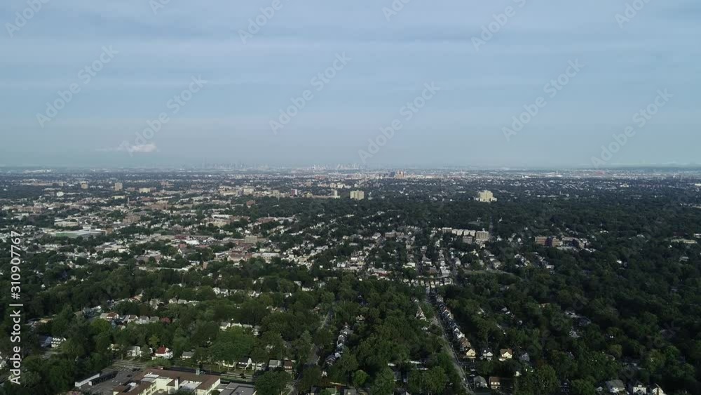 Iconic 4K aerial of a typical American suburbs neighborhood in summer ...