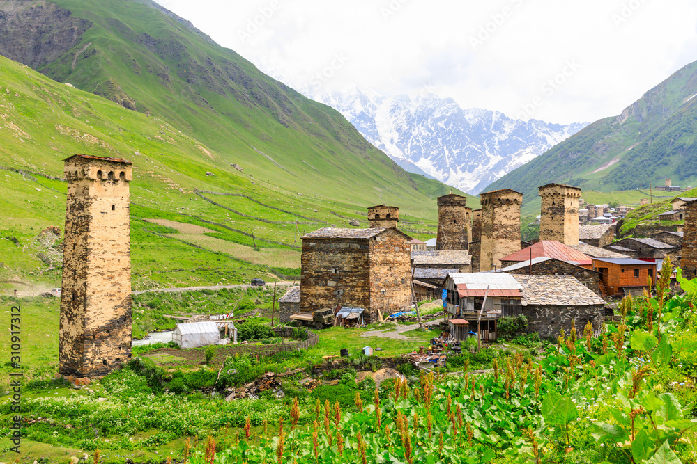 View of the Ushguli village at the foot of Mt. Shkhara. Picturesque and ...
