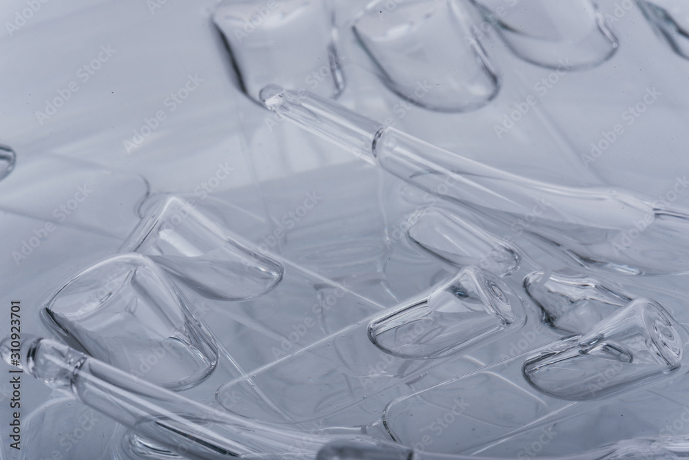 Glass medical ampoule vial for injection. Medicine is liquid sodium ...