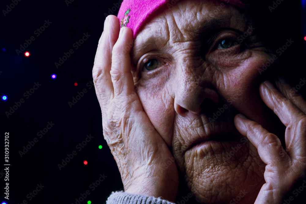 Sad eyes of mother. Wrinkled face of old grandmother. Portrait photo on ...