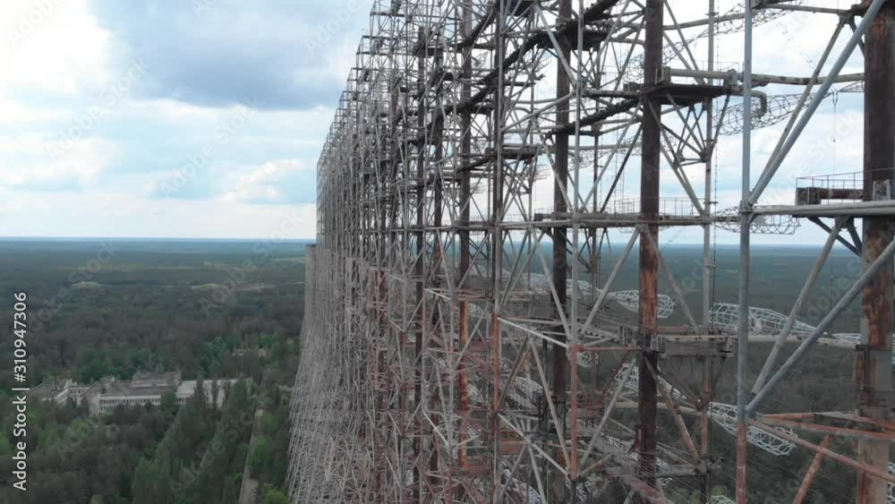Ascending aerial view of massive Duga radar antenna near Chernobyl ...