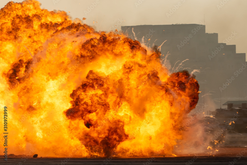Foto de Massive fire explosion or strike in military combat and war ...