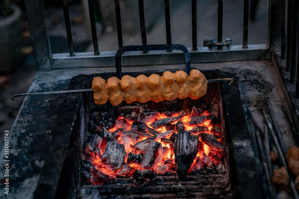 Preparing tandoori momos on the barbecue Stock Photo | Adobe Stock