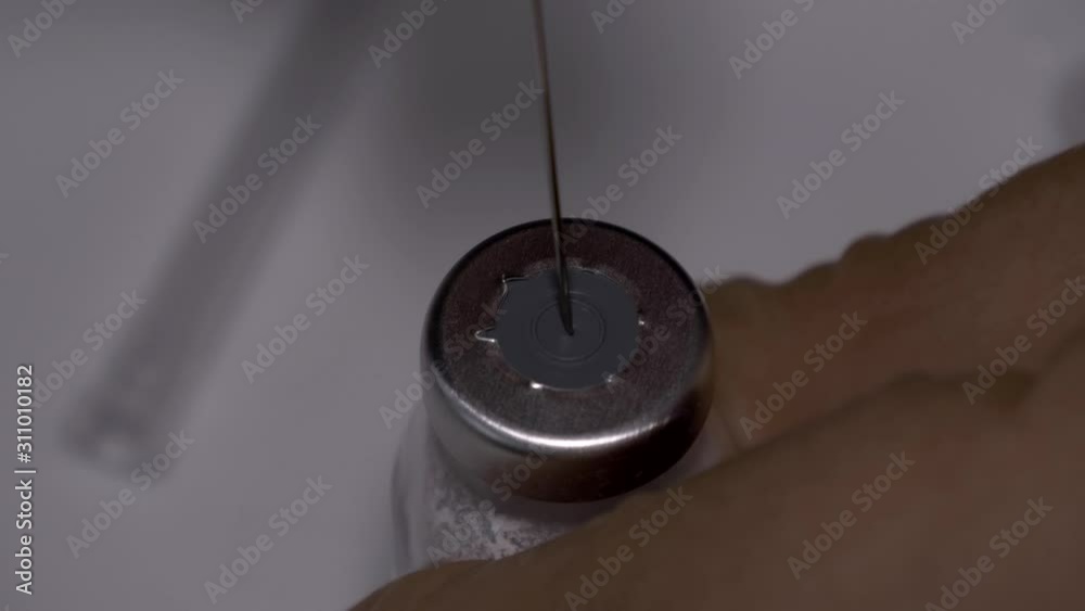 Injection. The introduction of a solvent with lidocaine into an ampoule ...