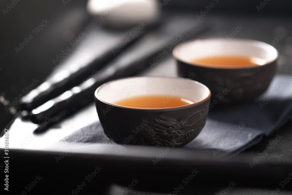 Asian tea ceremony. Chinese ceramic tea cups on stone dark background ...